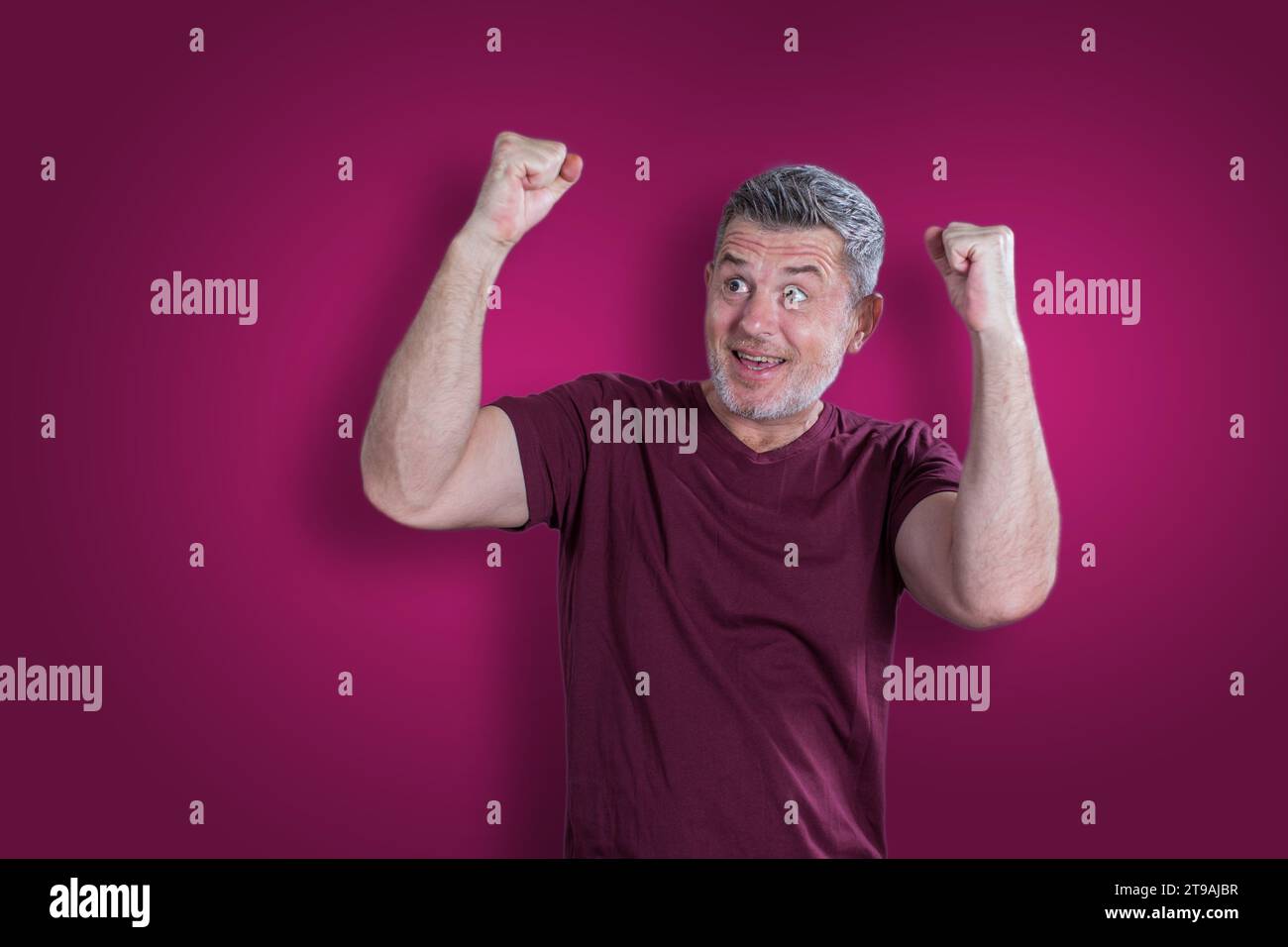 Excited and happy man standing with raised hands. Emotion concept Stock ...