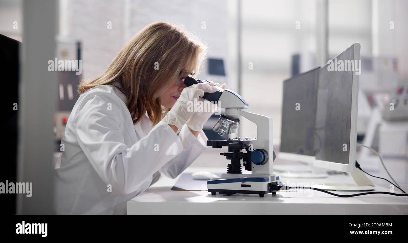 Female Doctor and Scientist Conducting Research in Computer Lab at ...