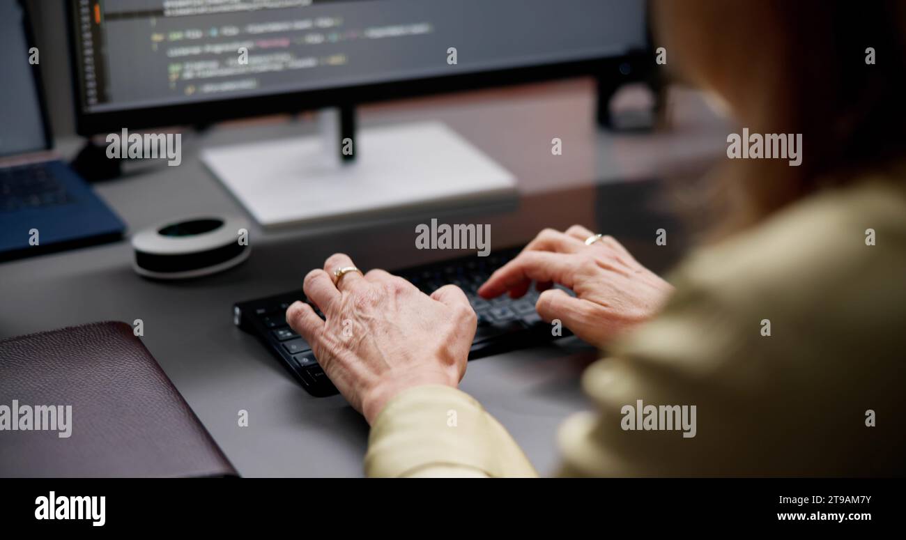 Girl programmer working laptop in hi-res stock photography and images ...