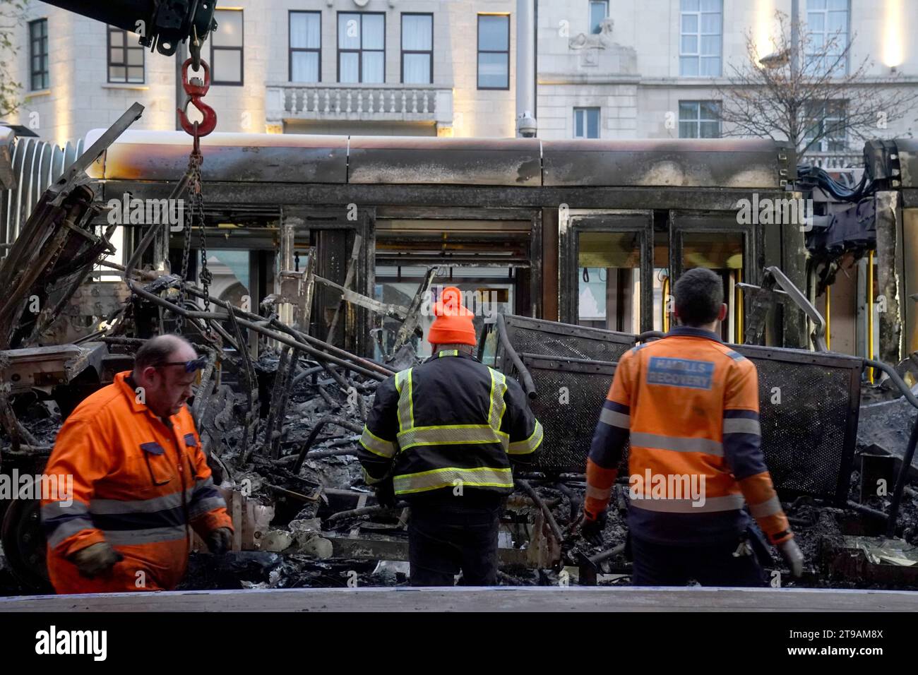 RETRANSMITTING AMENDING CAPTION TO BUS A burned out bus is removed from ...