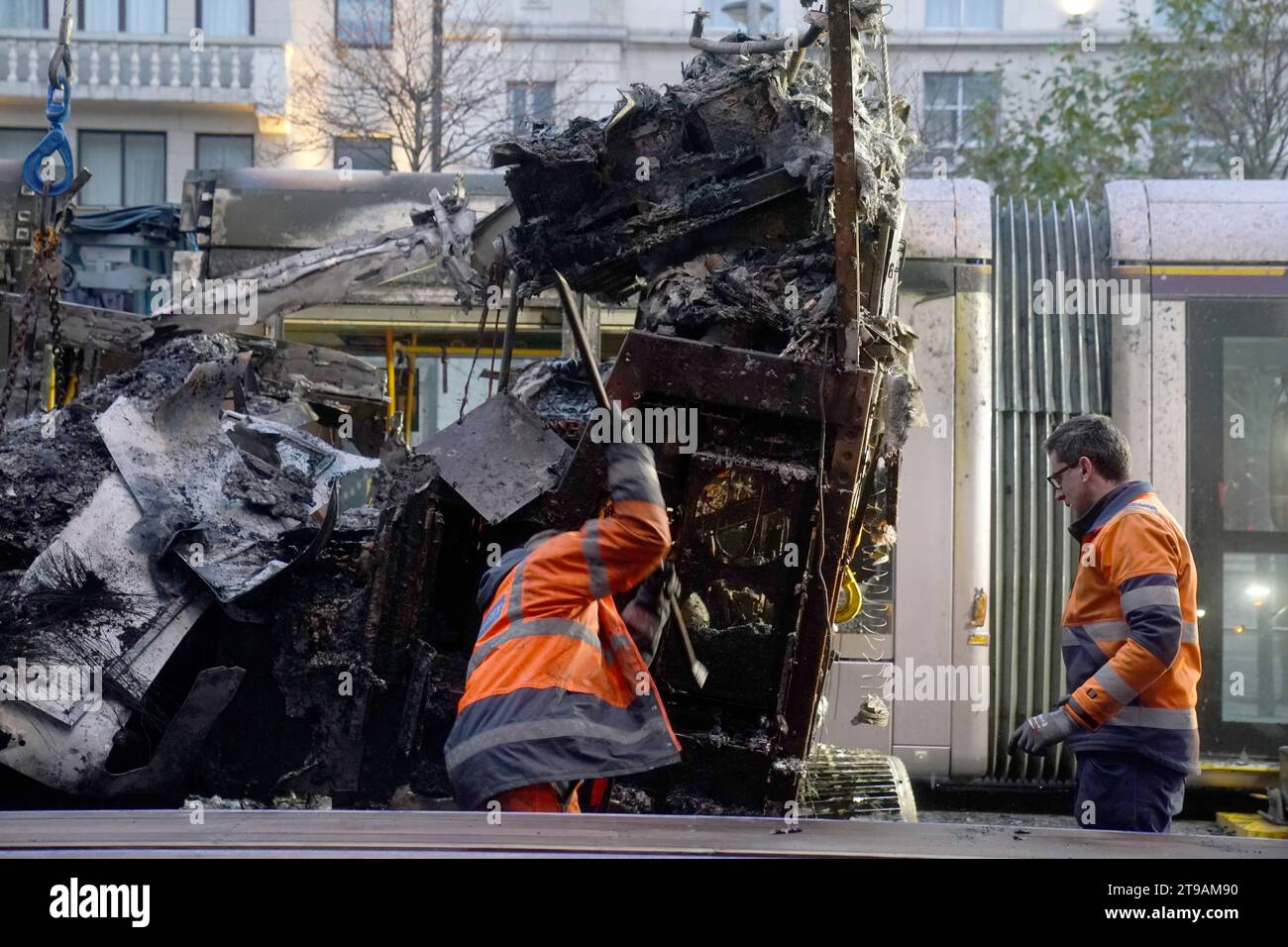 RETRANSMITTING AMENDING CAPTION TO BUS A burned out bus is removed from ...