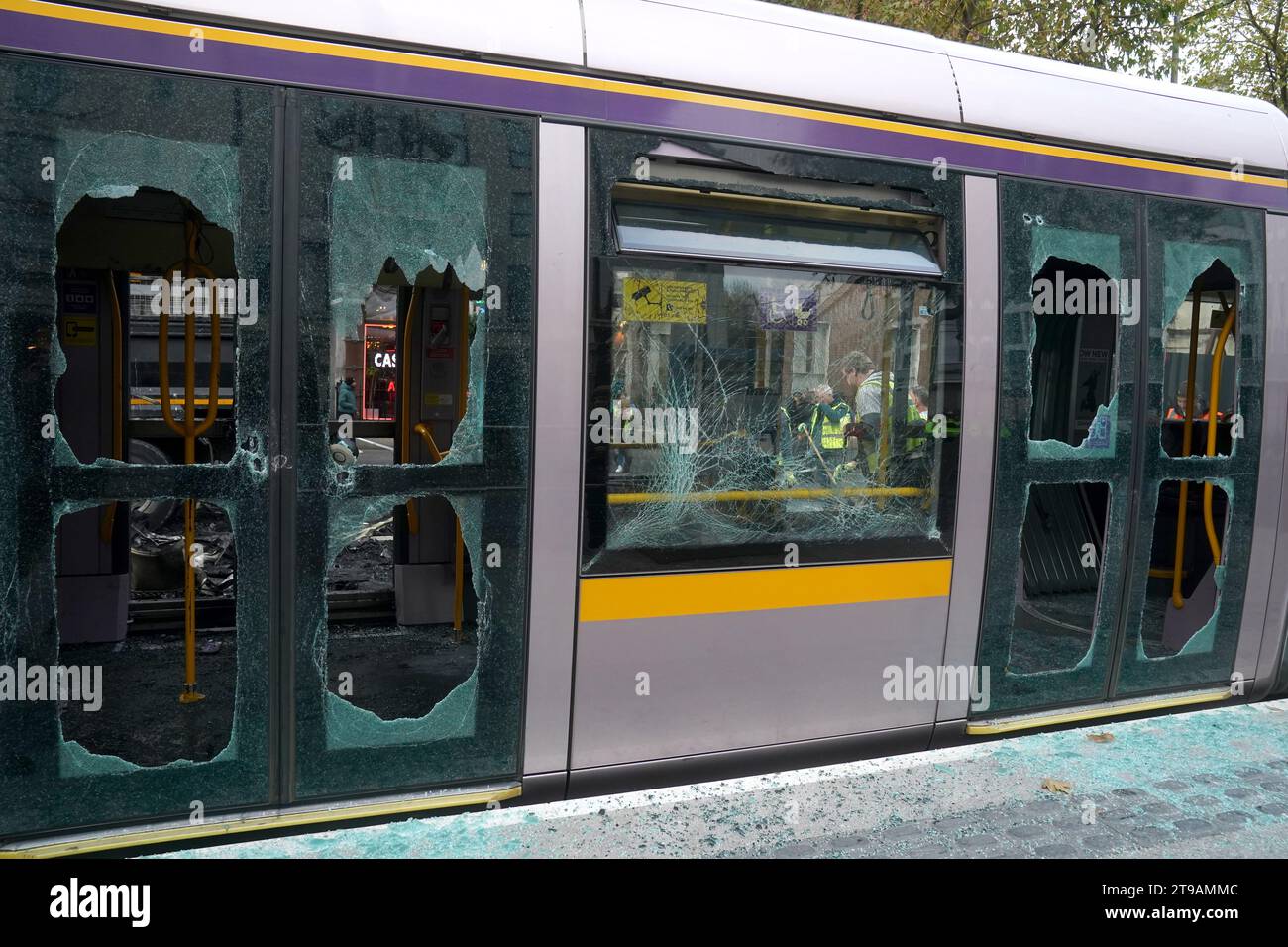 A damaged Luas with smashed windows and covered in debris on O'Connell ...