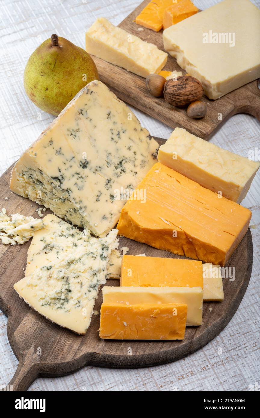 English cheeses collection, mature and coloured cheddar cheese and semi ...