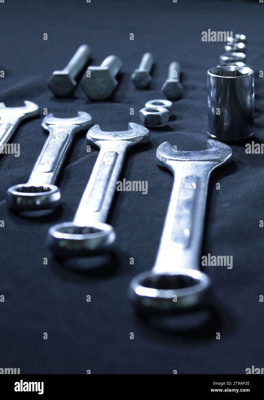 Metal Socket Wrench Bits, Screw Bolts And Steel Wrenches In A Size ...