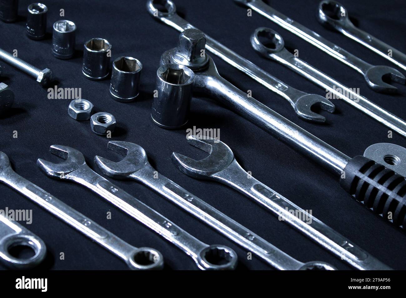 Steel Shiny Set Of Spanners, Sockets, Quick Release Ratchet And Hardware Items Laid Out In Order ...