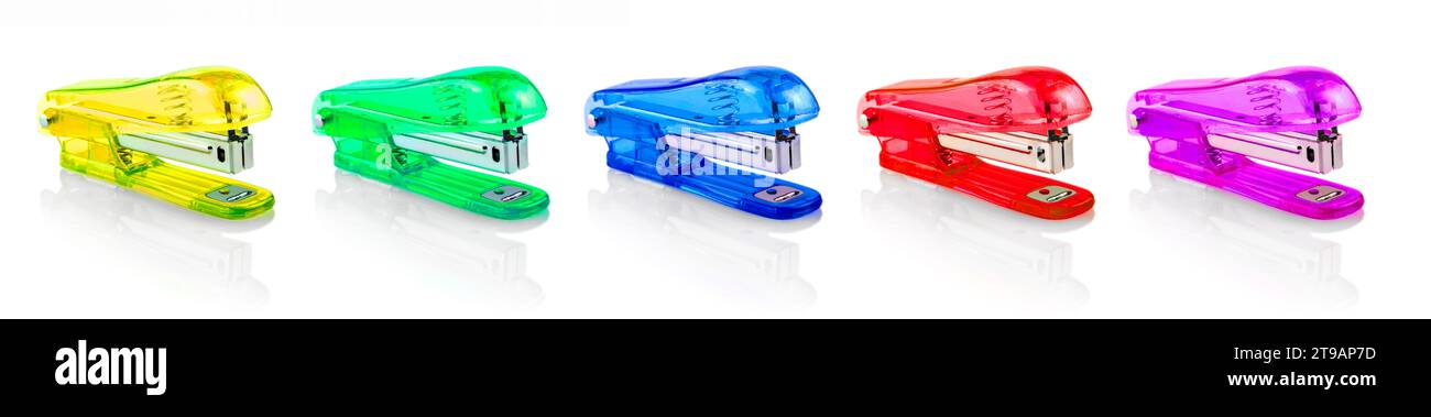 The set of colored glass staplers isolated on white background Stock ...