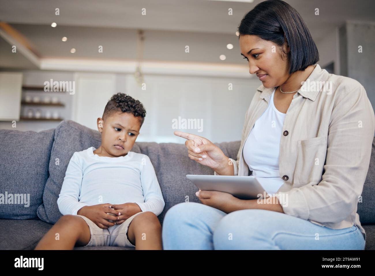 Mother, child and scolding or discipline, tablet and punishment at home ...