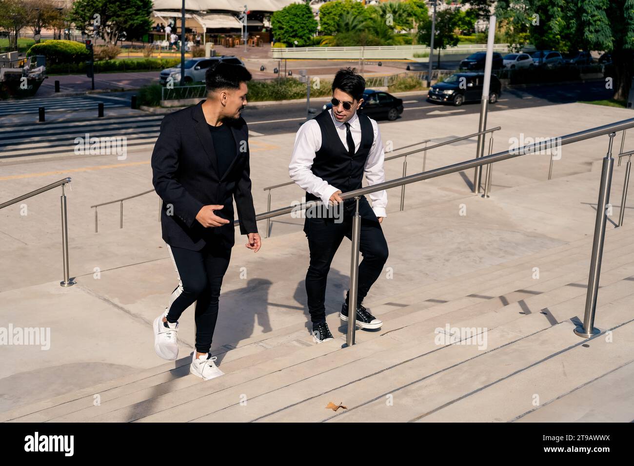 Happy male chatting with people hi-res stock photography and images - Alamy
