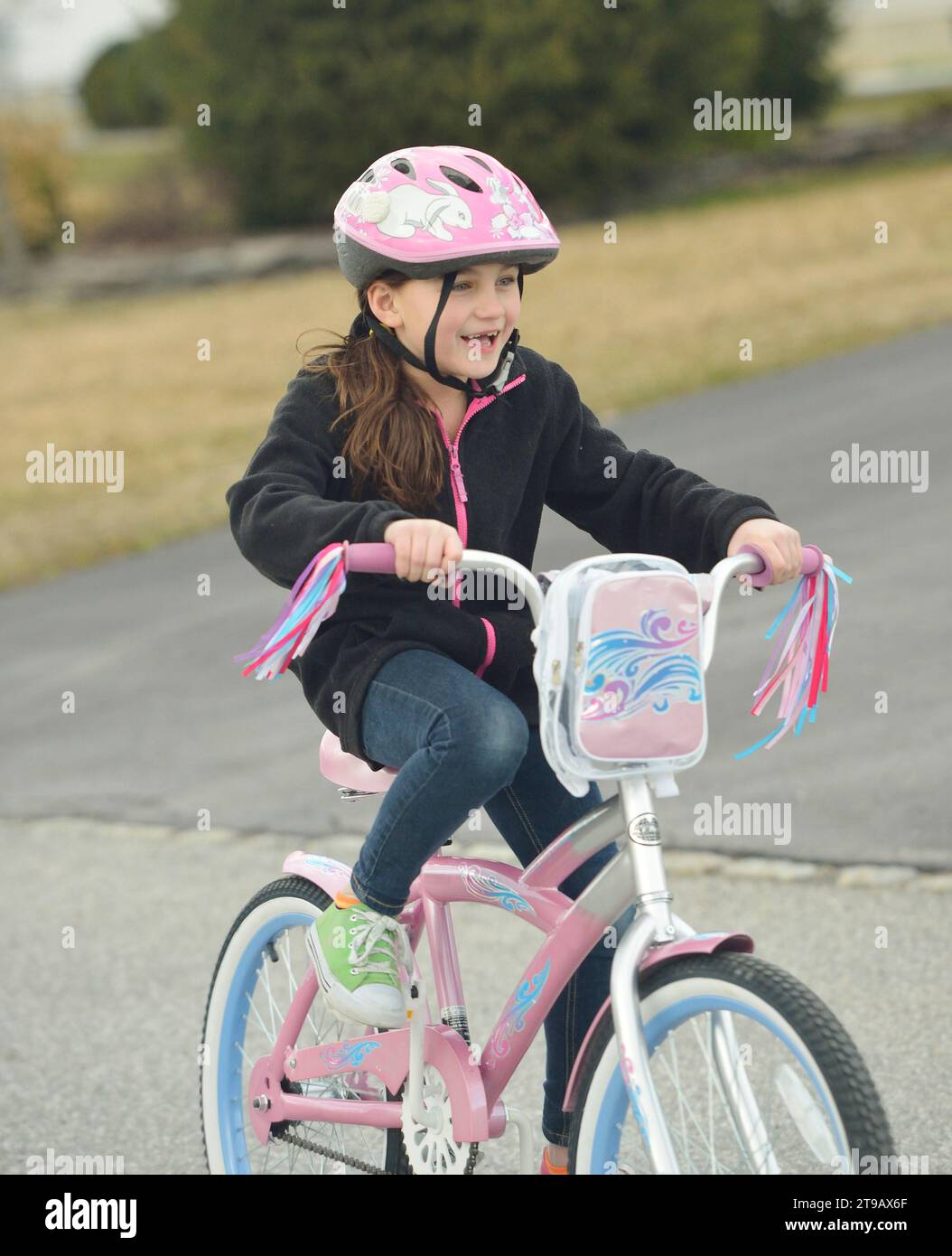 Girl riding on her new bicycle hi-res stock photography and images - Alamy