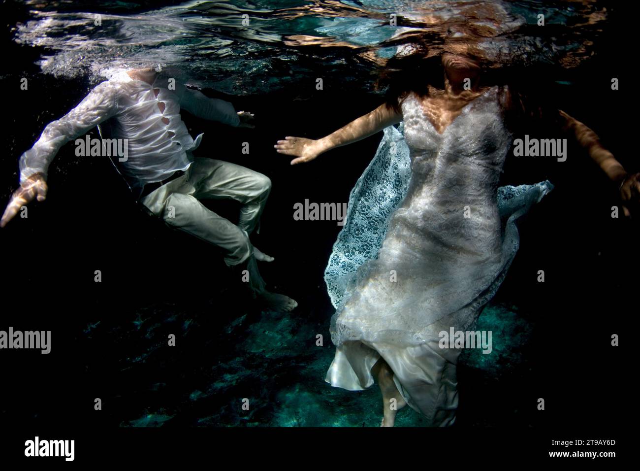 Man underwater clothes hi-res stock photography and images - Alamy