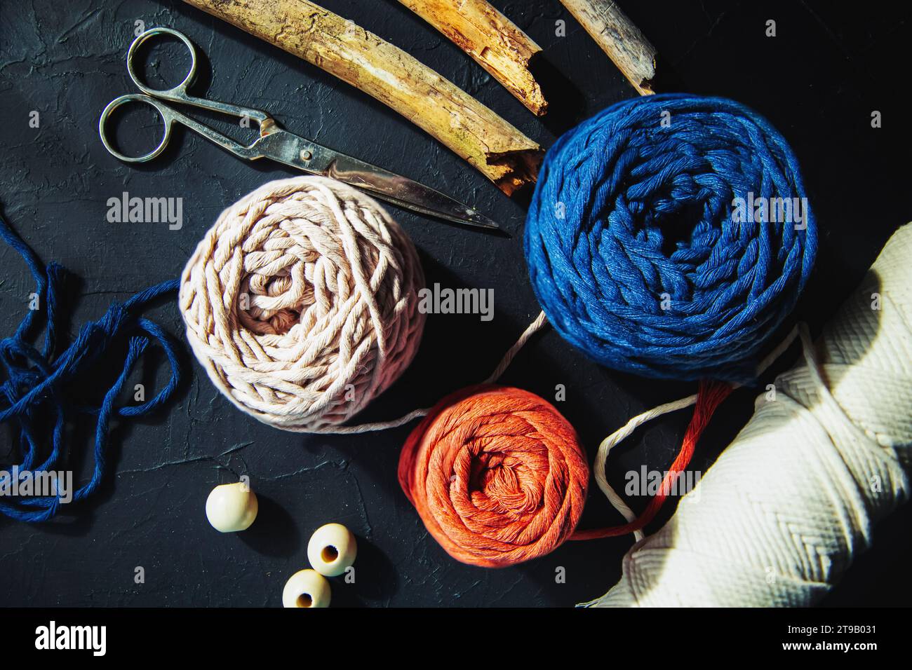 Tools for weaving in macrame technique. Cotton cords, scissors ...