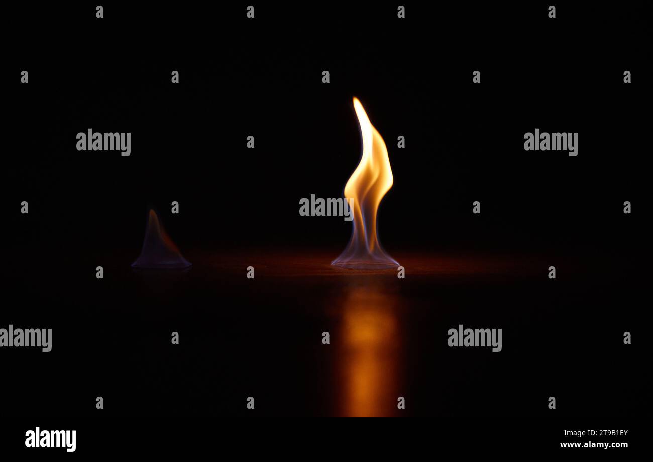 Flame, heat and fire start with black background with sparks, smoke and ...
