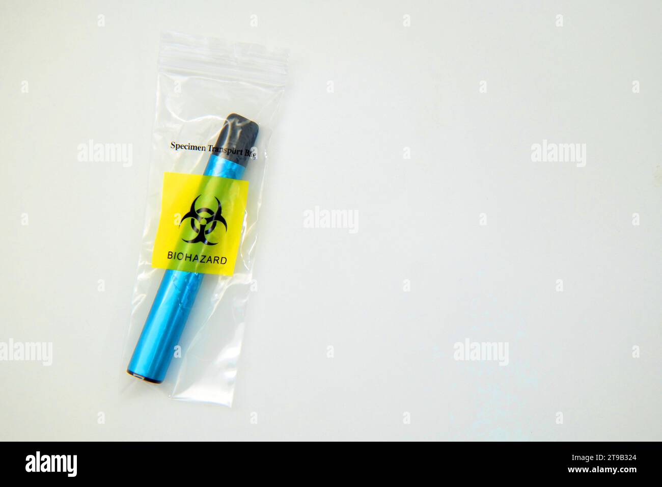 A discarded vibrant blue single use electronic cigarette vape has been ...