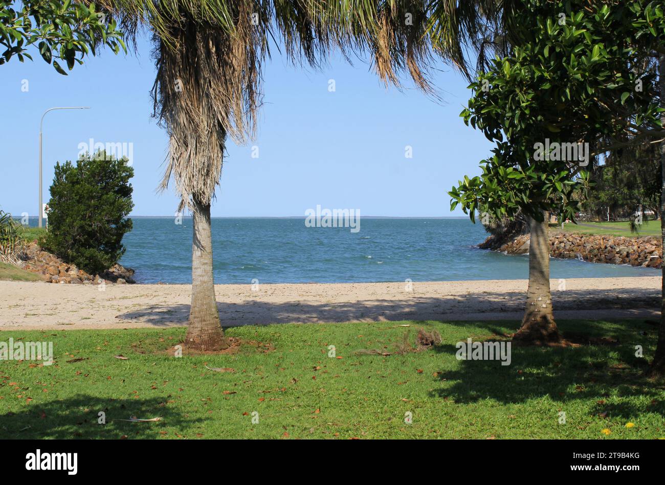 Beach, ocean and trees at Spinnaker Park in Gladstone, Queensland ...