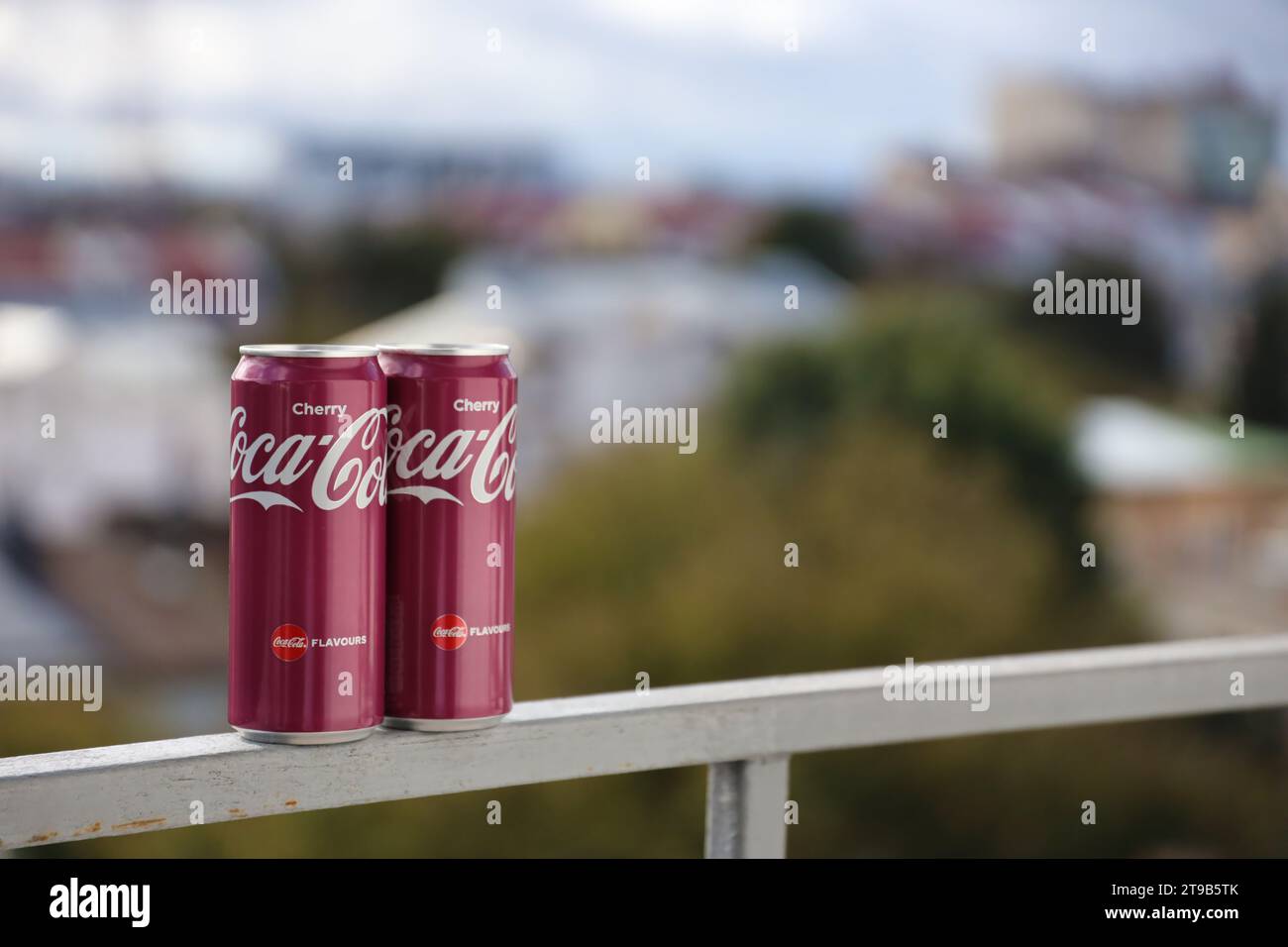KYIV, UKRAINE - 4 MAY, 2023: Coca cola soft drinks brand tin cans with ...