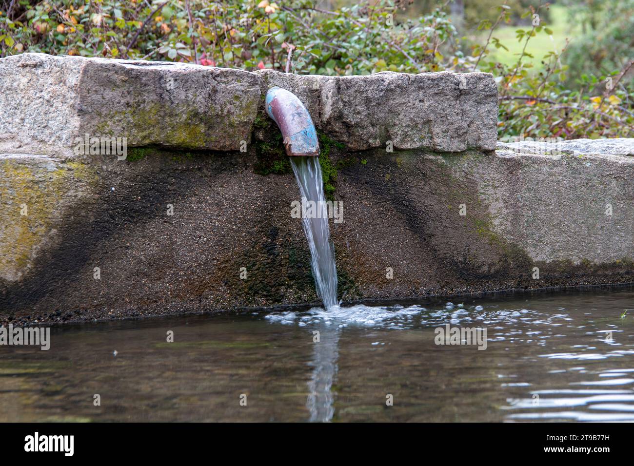 Rural fountain, also known as "caño" where you can see the stream of ...