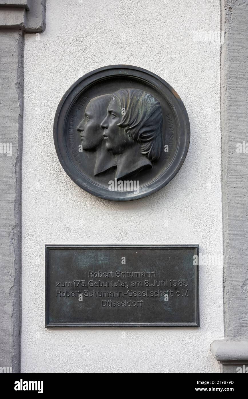 Duesseldorf, Germany. 24th Nov, 2023. Cast iron portraits of Clara and ...