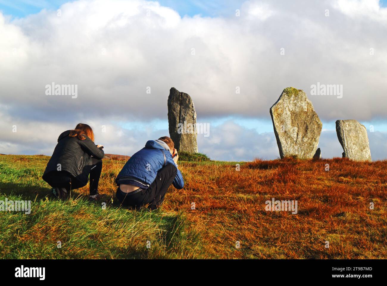A view of two young photographers shooting the historic Neolithic ...