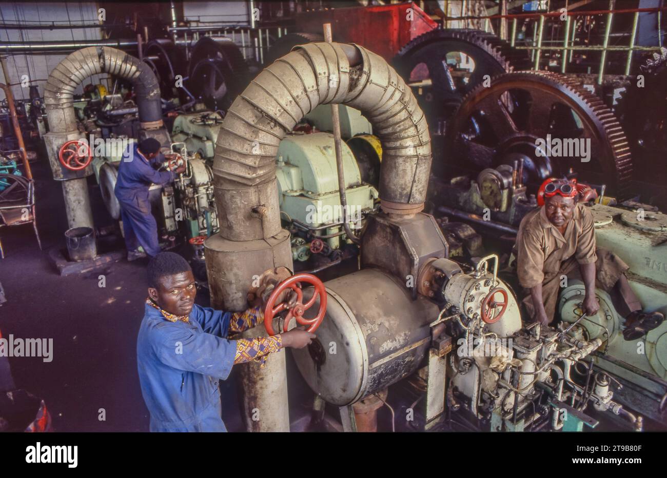 Tanzania, Kilombero - factory workers carry out major maintenance on ...