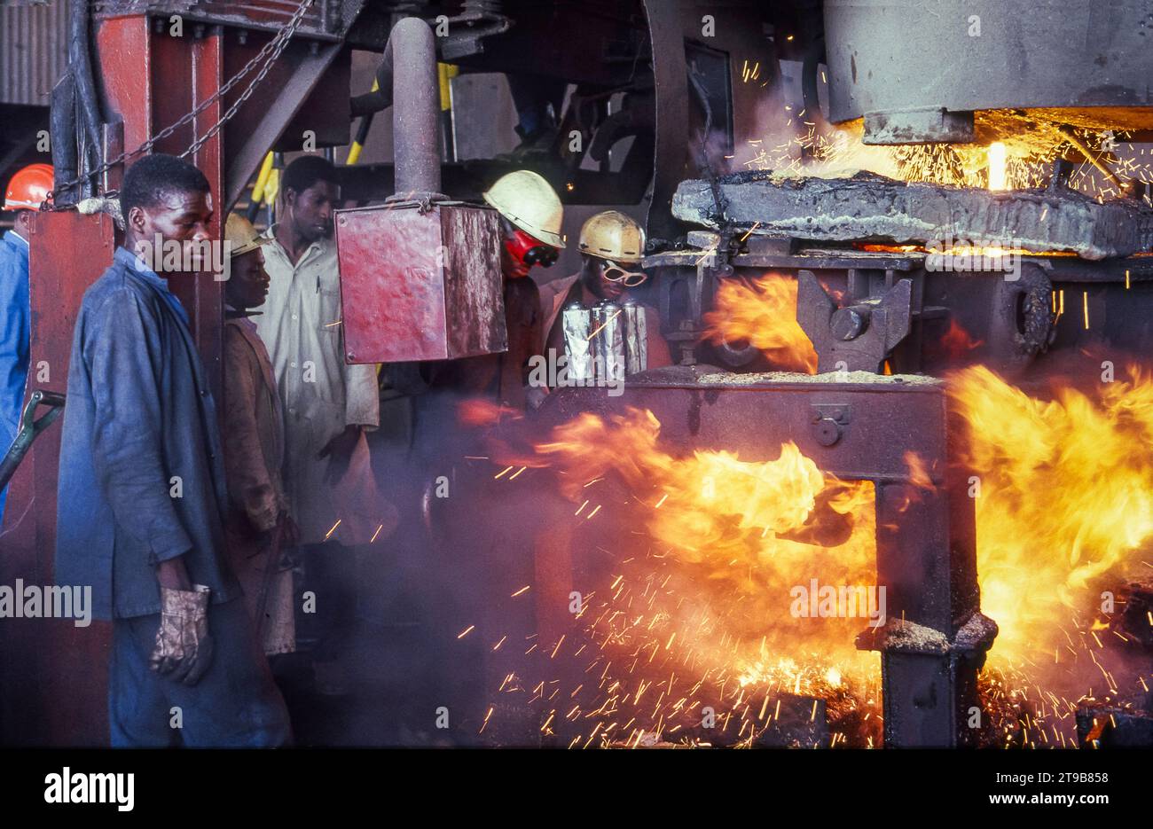 Tanzania,Dar es Salaam - Recycled metal iis melted n a steel factory ...