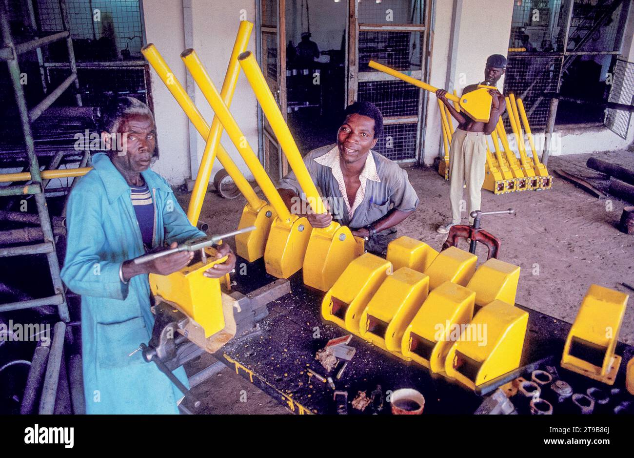 Tanzania, Morogoro. Production of water pumps in a factory Stock Photo ...