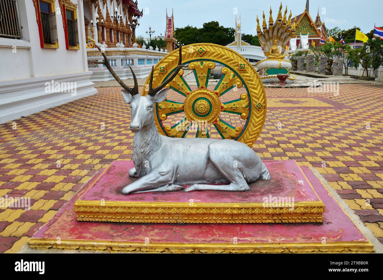 Art sculpture carving crouching deer figure and wheel of Dharmachakra ...