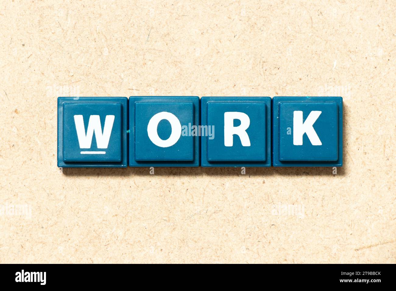 Tile alphabet letter in word work on wood background Stock Photo - Alamy