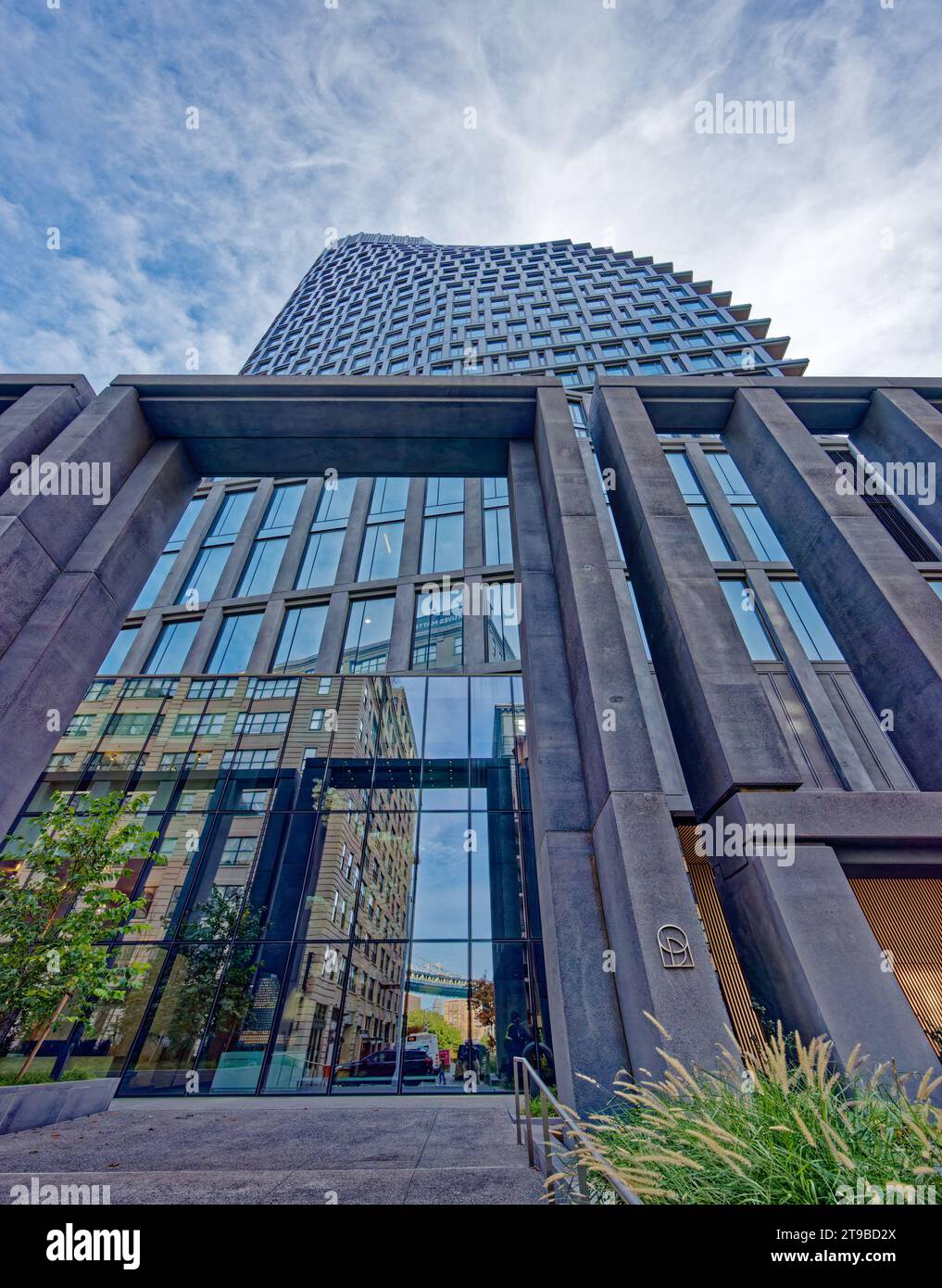 A three-story colonnade screens the front of Olympia DUMBO, the 33 ...