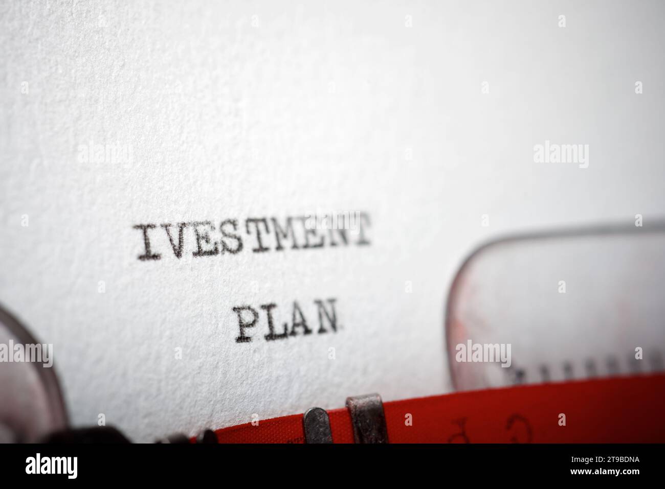 Investment plan text written with a typewriter Stock Photo - Alamy