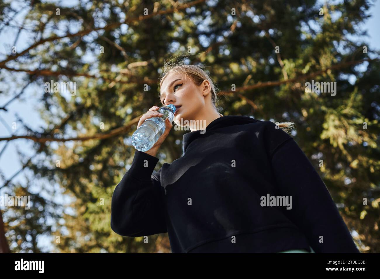 Drinking water after working out hi-res stock photography and images ...