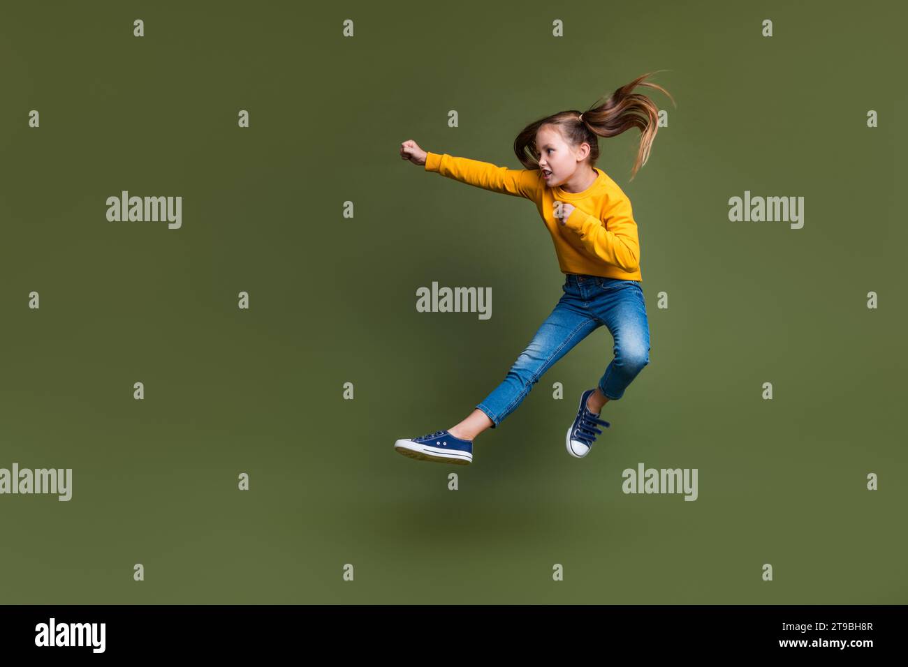 Full size photo of small kid with tails hair wear pullover flying on ...