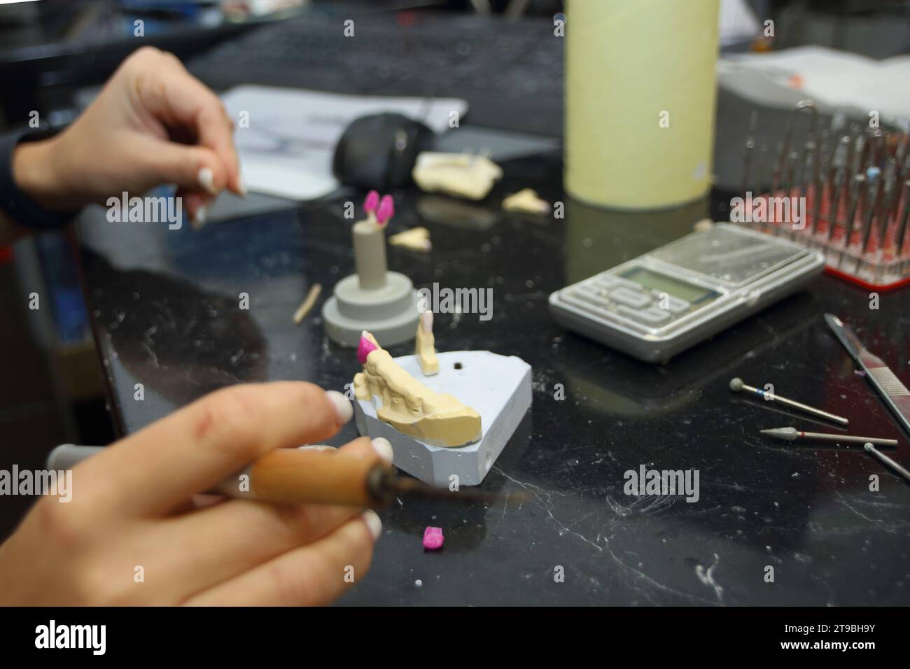 Fabrication of dental crowns and dentures made of ceramic. Scanning of ...