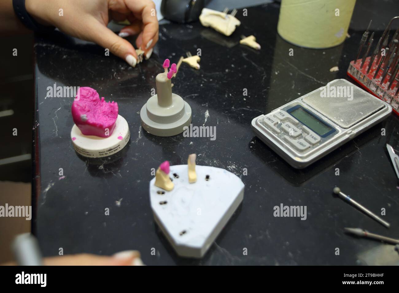 Fabrication of dental crowns and dentures made of ceramic. Scanning of ...