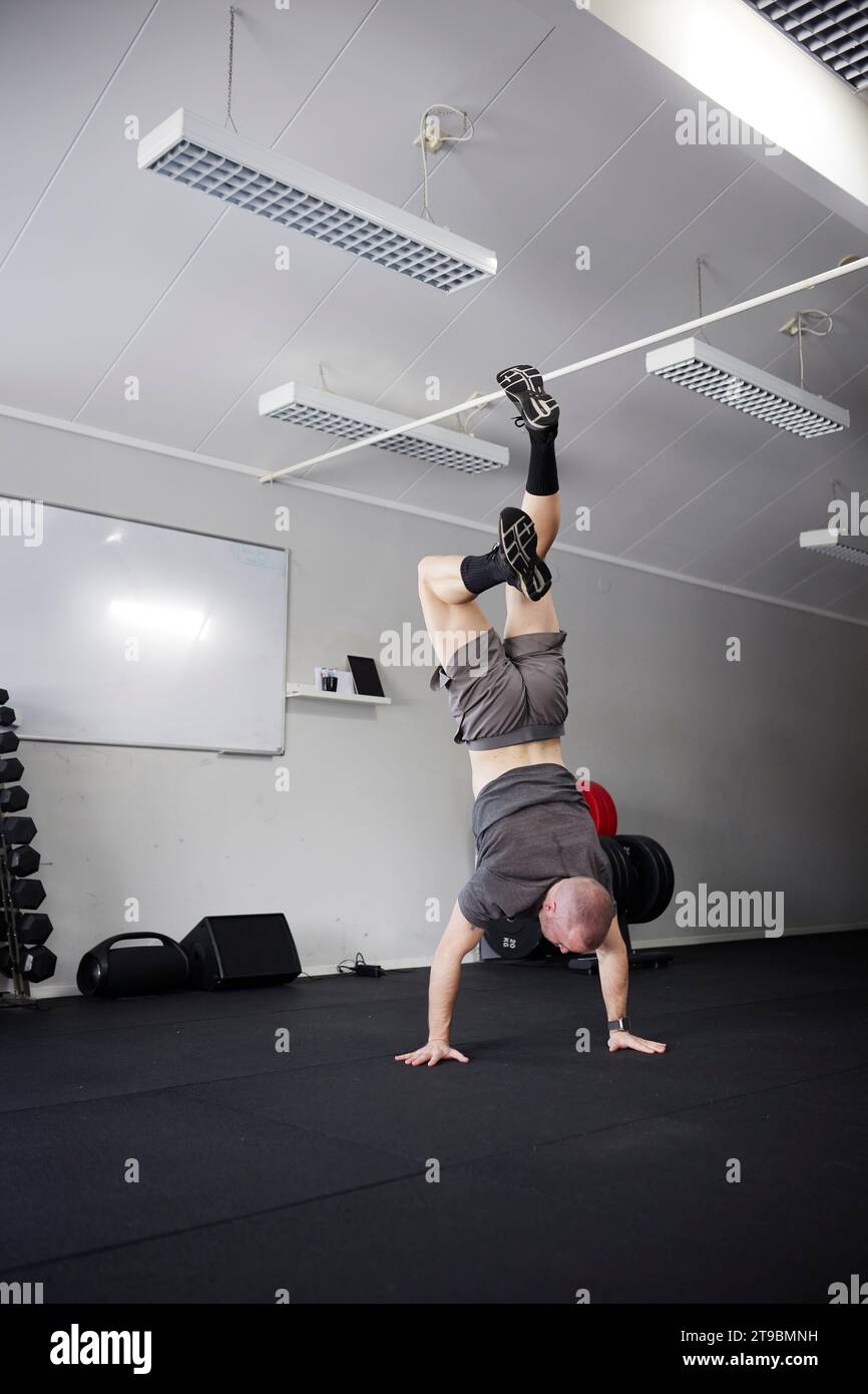 Man doing a handstand hi-res stock photography and images - Alamy