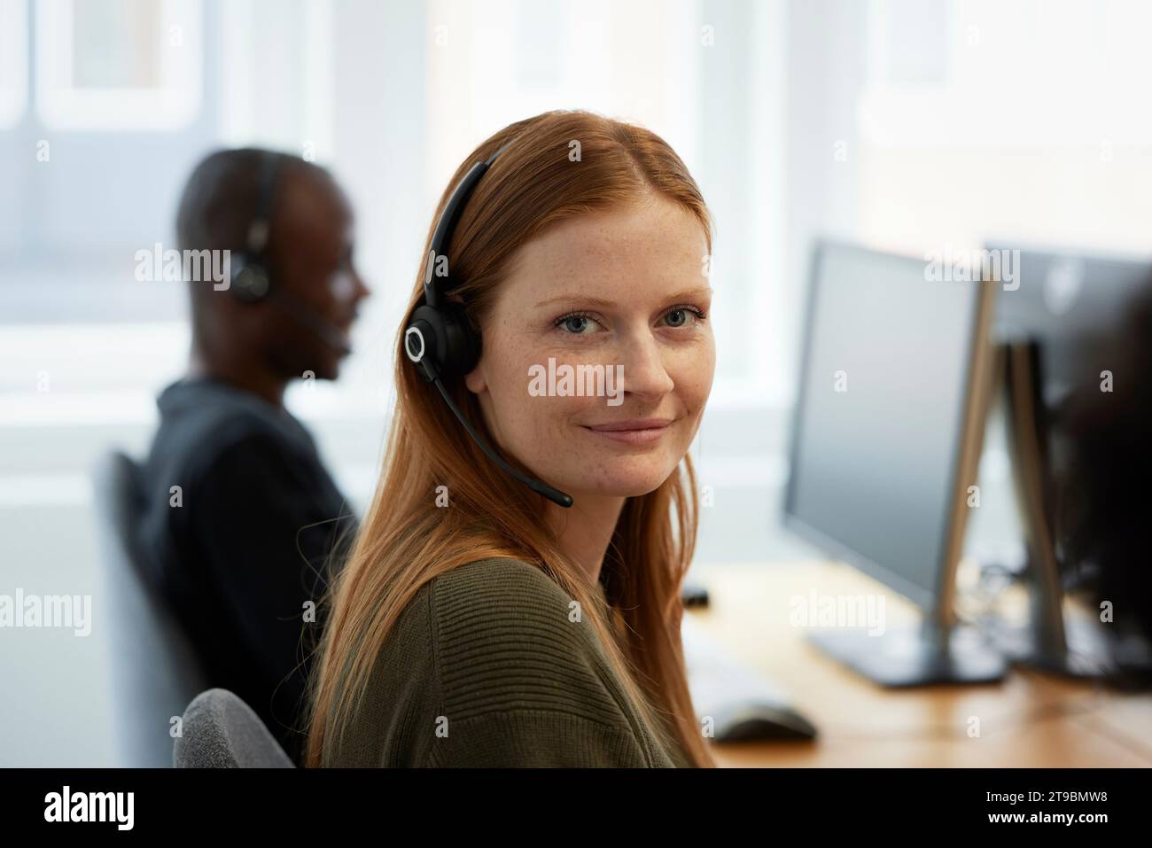 Portrait of smiling female call center employee Stock Photo - Alamy Portrait of smiling female call center employee Stock Photo - Alamy