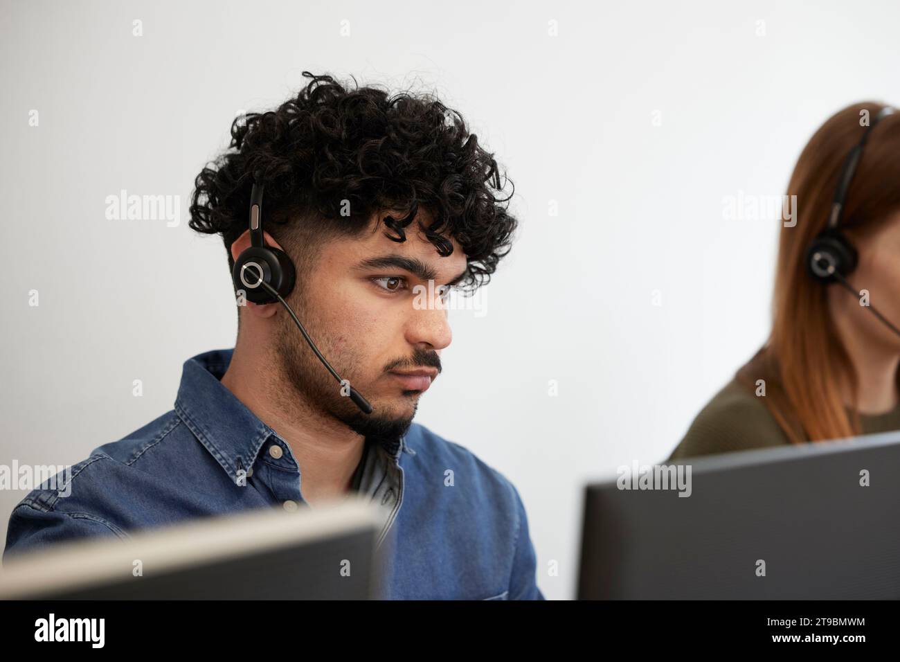 Diverse call center employees at work Stock Photo - Alamy