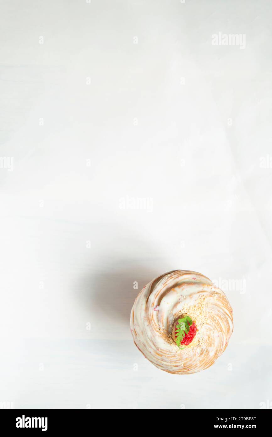 Sweet pastry with garnish on white background Stock Photo - Alamy
