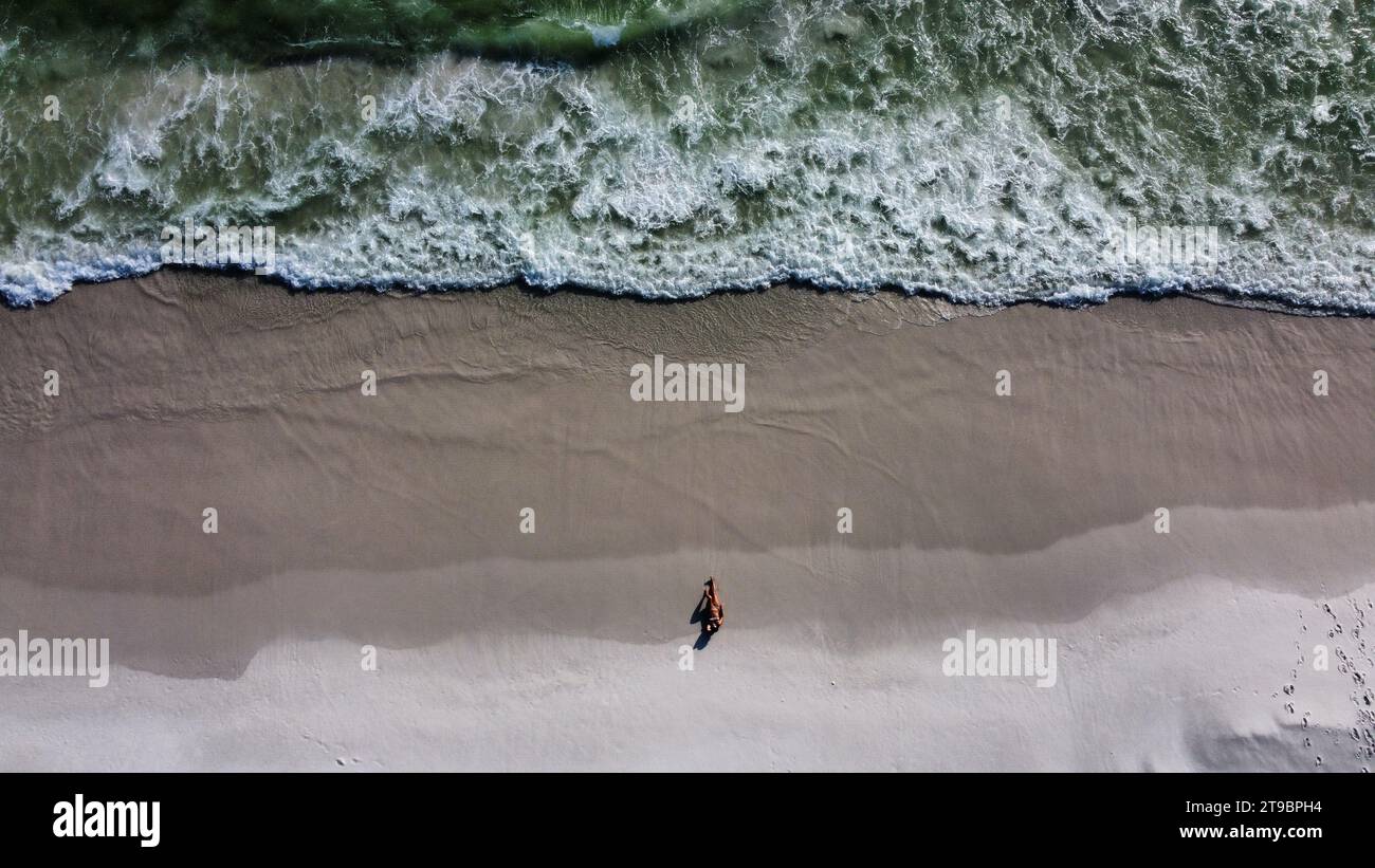 Top view of the beach, the ocean and the cliffs of Arraial do Cabo in ...