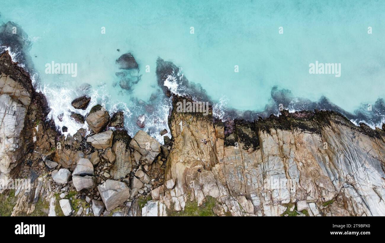 Cliff on the ocean in Arraial do Cabo, Brazil. Beautiful natural colors ...