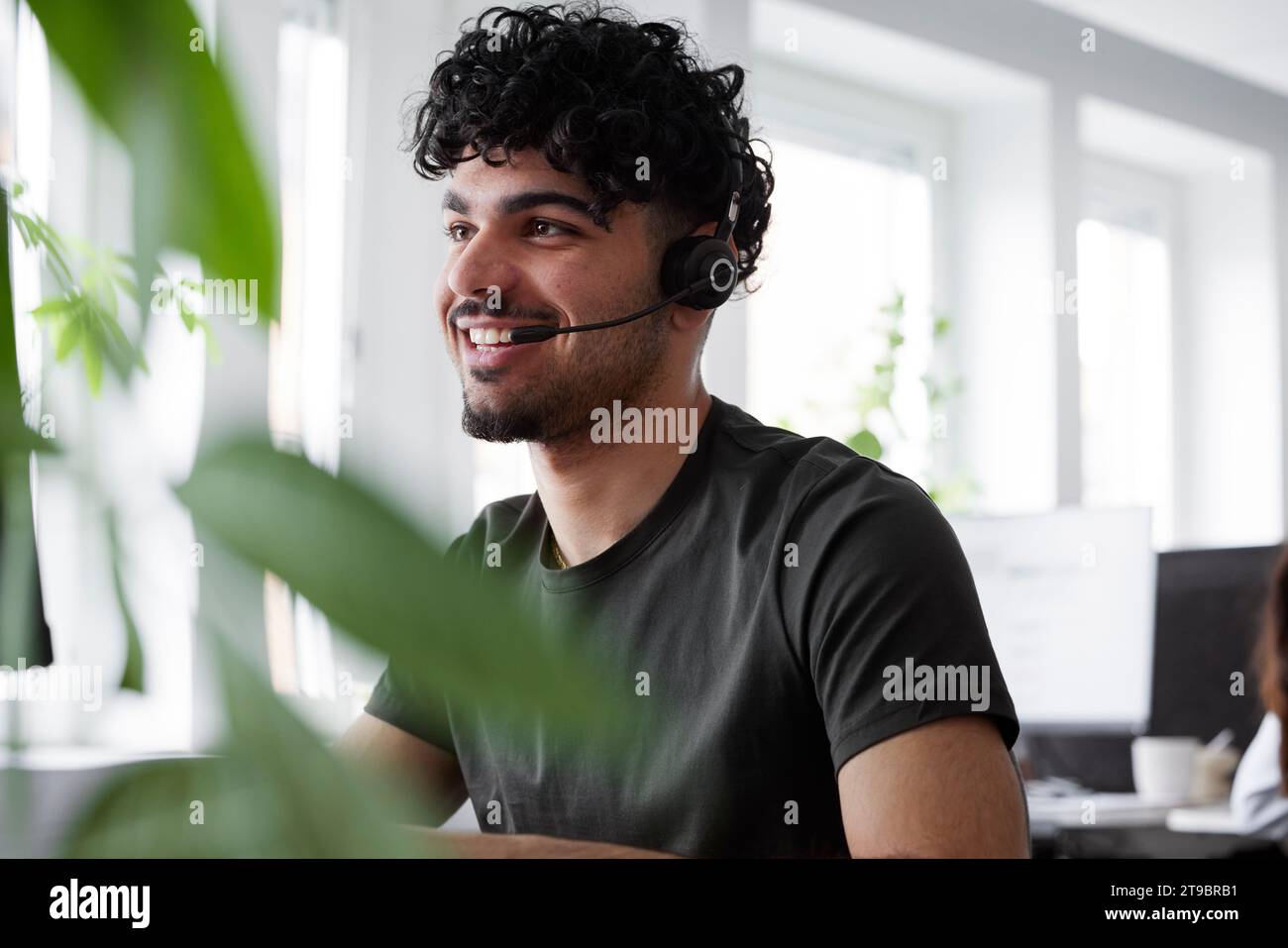 Young bearded man wearing headset hi-res stock photography and images ...
