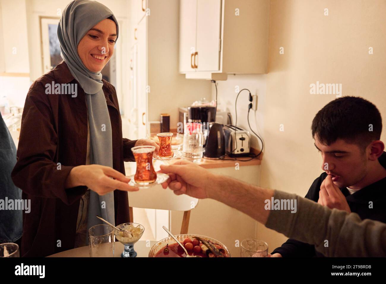 Family drinking tea hi-res stock photography and images - Alamy