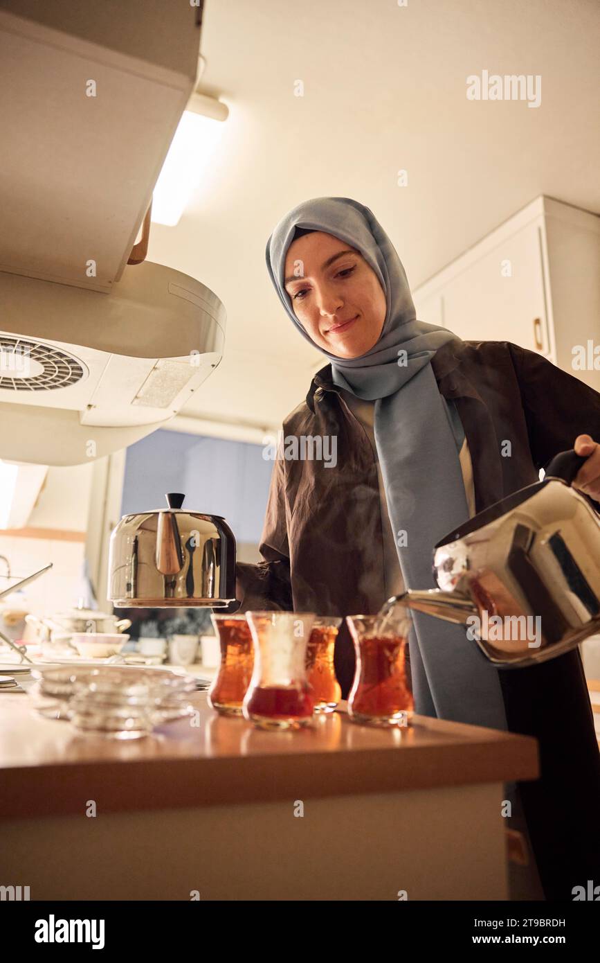 Woman preparing drinks home hi-res stock photography and images - Alamy