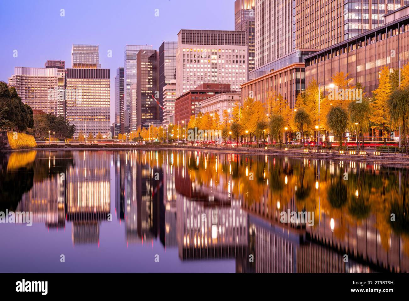 Night view of Marunouchi and Hibiya in Tokyo with water reflection ...