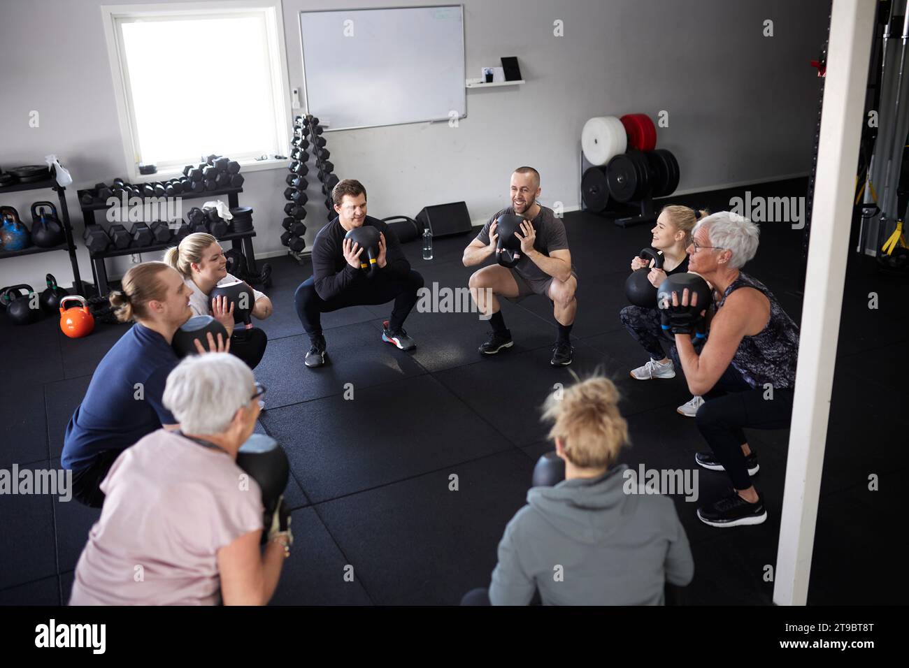Old lady squatting gym hi-res stock photography and images - Alamy
