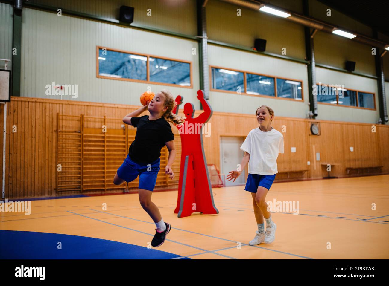 Children playing handball hi-res stock photography and images - Alamy