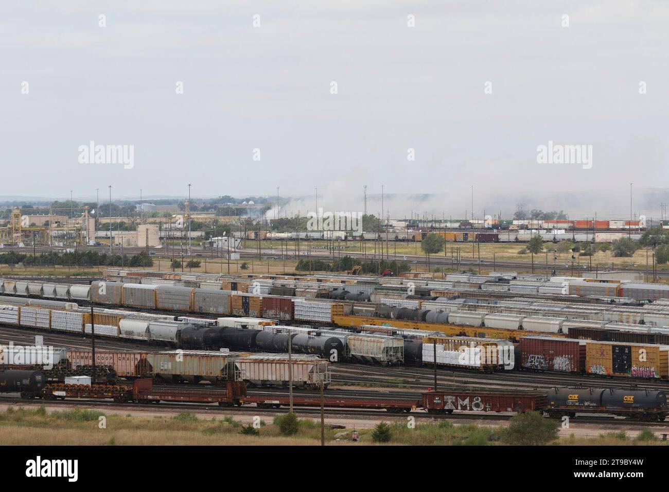 FILE - Smoke emanates from a railroad car after an explosion at Union ...