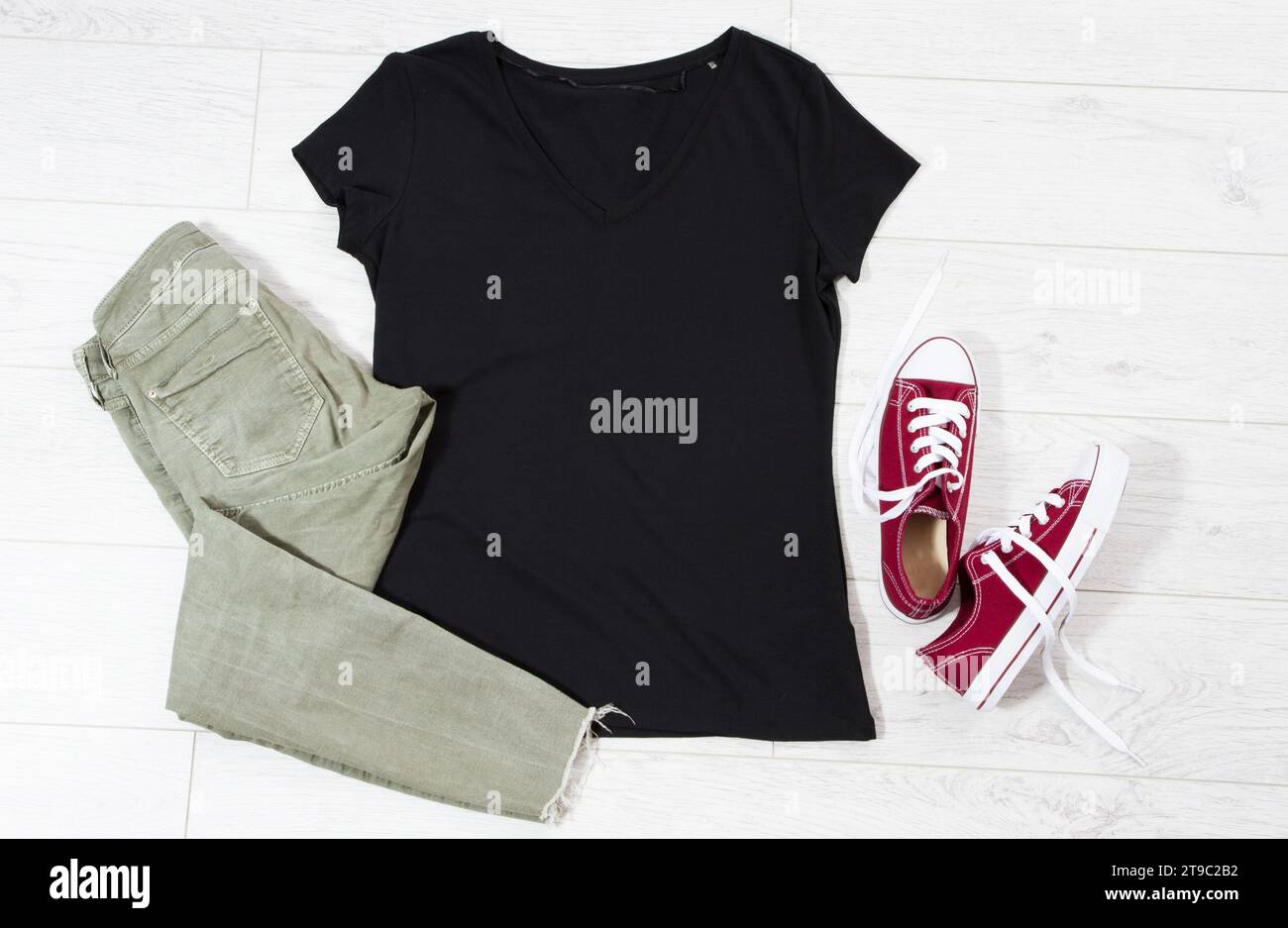 Black t-shirt mock up on wooden background, casual clothes background ...