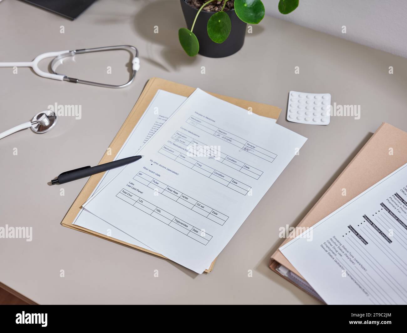 From above medical paperwork lying down on the doctor's table Stock ...