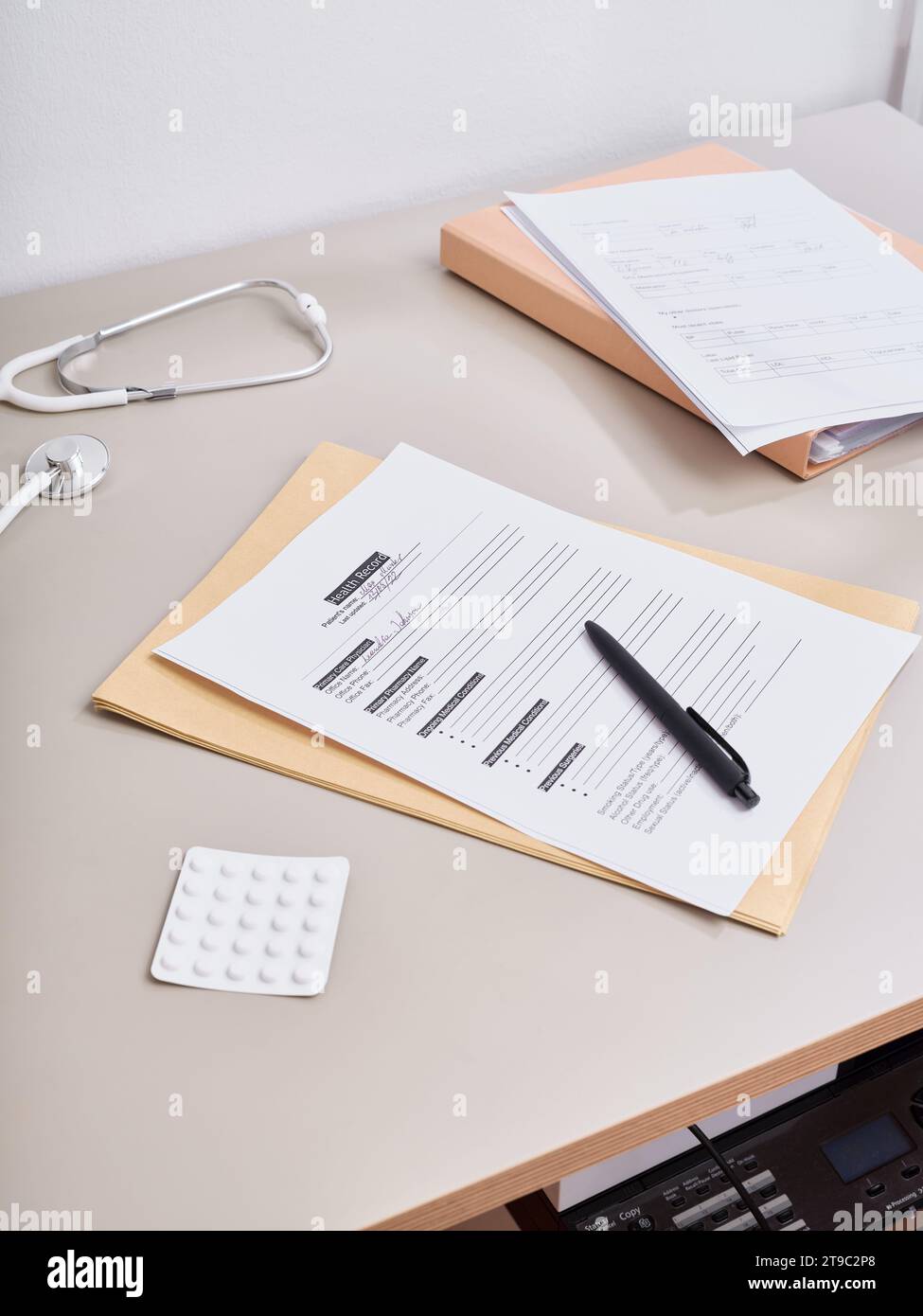 From above medical paperwork lying down on the doctor's table Stock ...