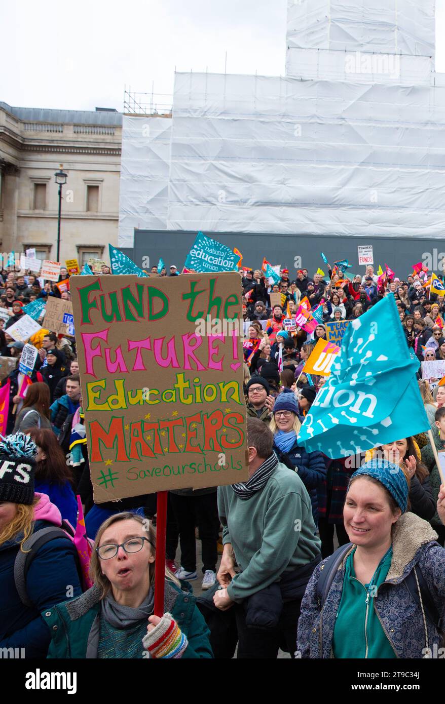 Placards are held during a march and rally called by the NEU (National ...